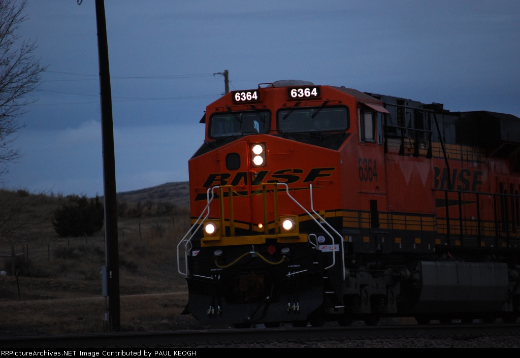 BNSF 6364 zoom shot as she rounds the Y rolling south with an empty coal train off the Gillette Sub.